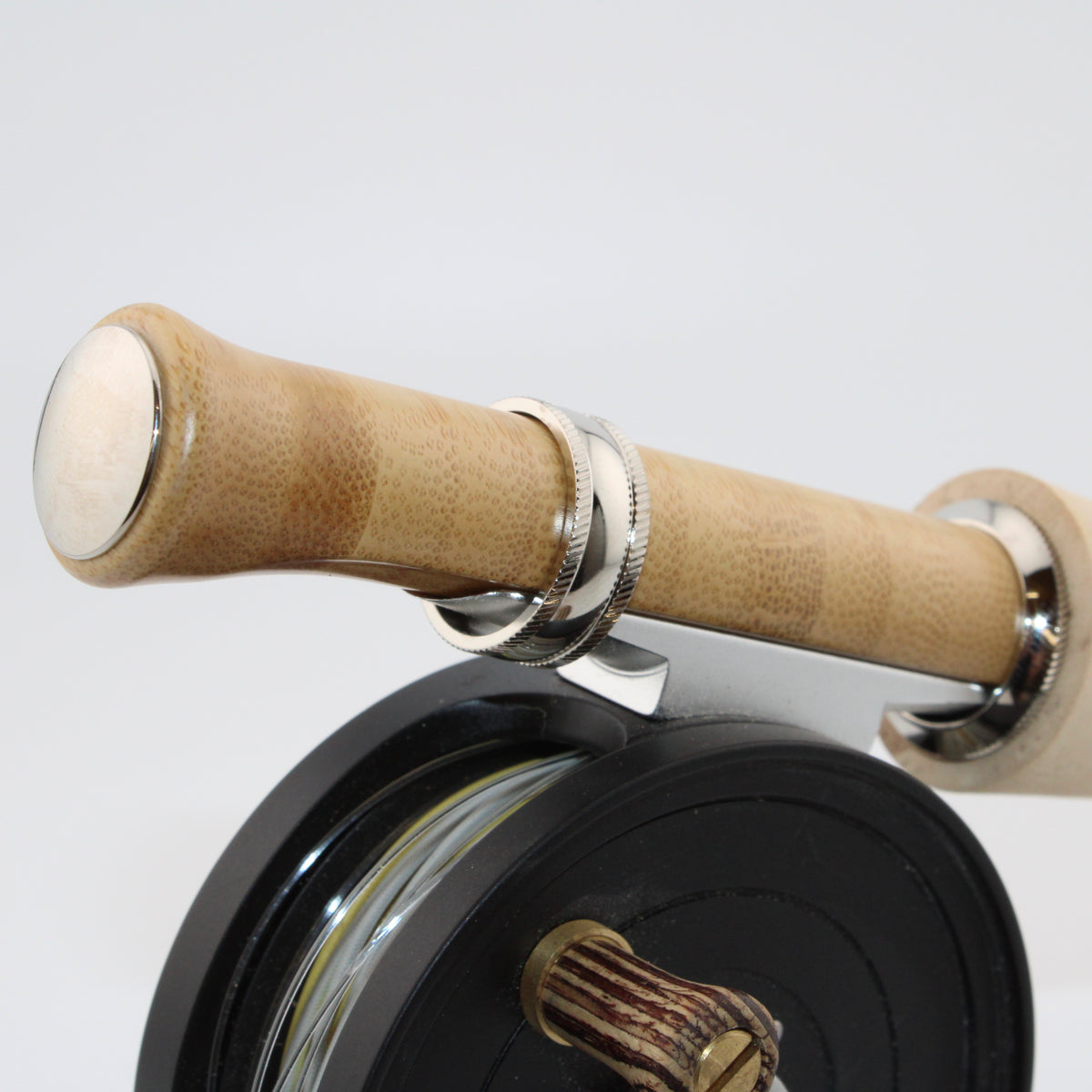 Up-locking mortised slide band reel seat in stacked bamboo with plated ...